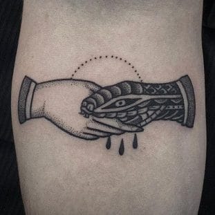 15+ Handshake Tattoo Designs: The Hand That Bites Tattoo - PetPress