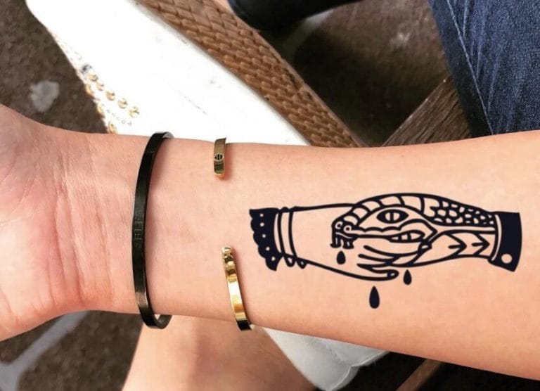 15+ Handshake Tattoo Designs: The Hand That Bites Tattoo - PetPress
