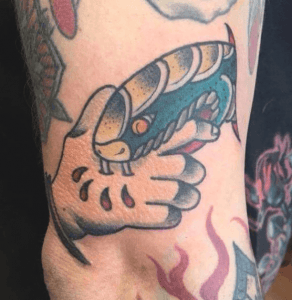 12 Best Snake Bite Tattoos That Will Shock You - PetPress