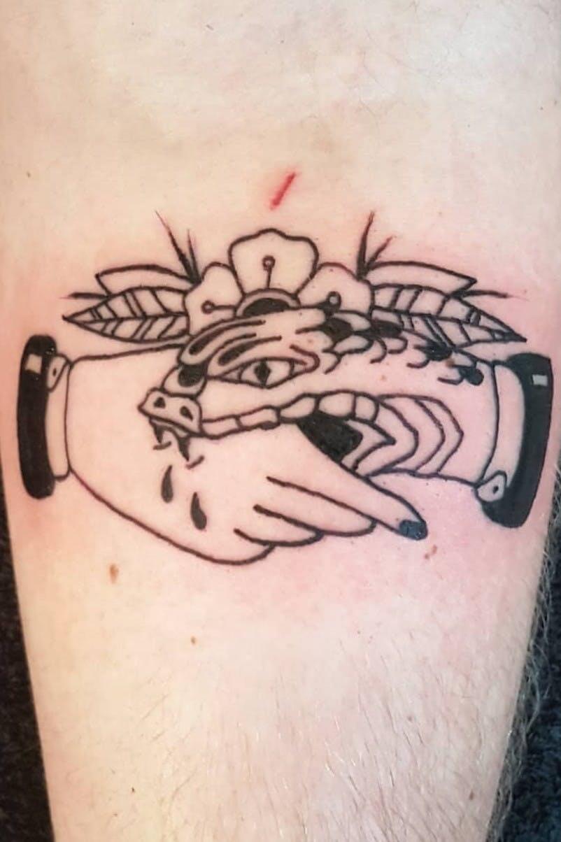 12 Best Snake Bite Tattoos That Will Shock You - PetPress