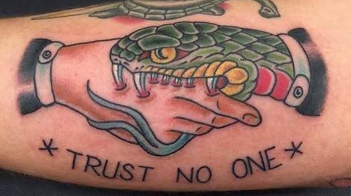 12 Best Snake Bite Tattoos That Will Shock You - PetPress