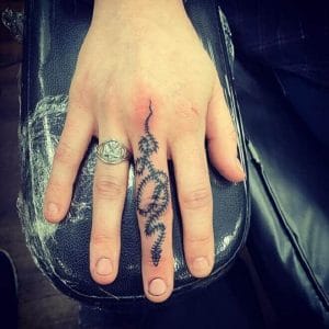 15 Snake Skeleton Tattoo Designs & Ideas - PetPress